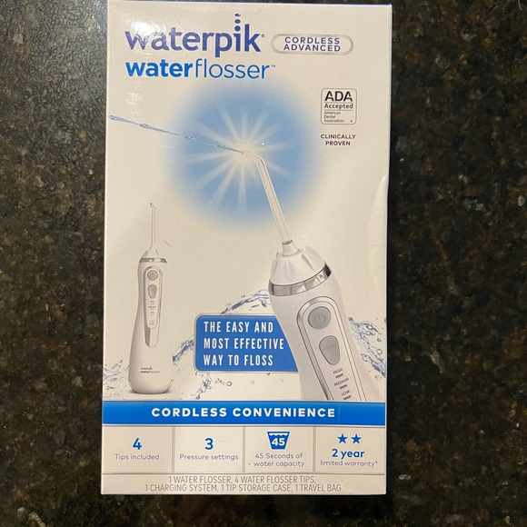 Waterpik | Other | New In Box Waterpik Waterflosser With 4 Tips 3 ...